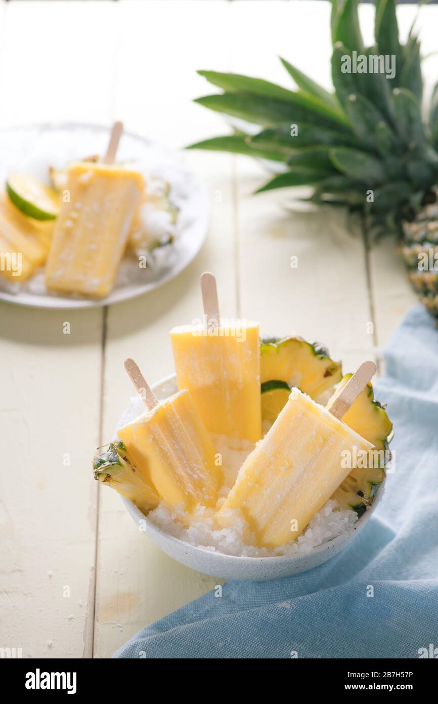 Homemade ice cream or popsicles from pineapple decorated. Top view ...