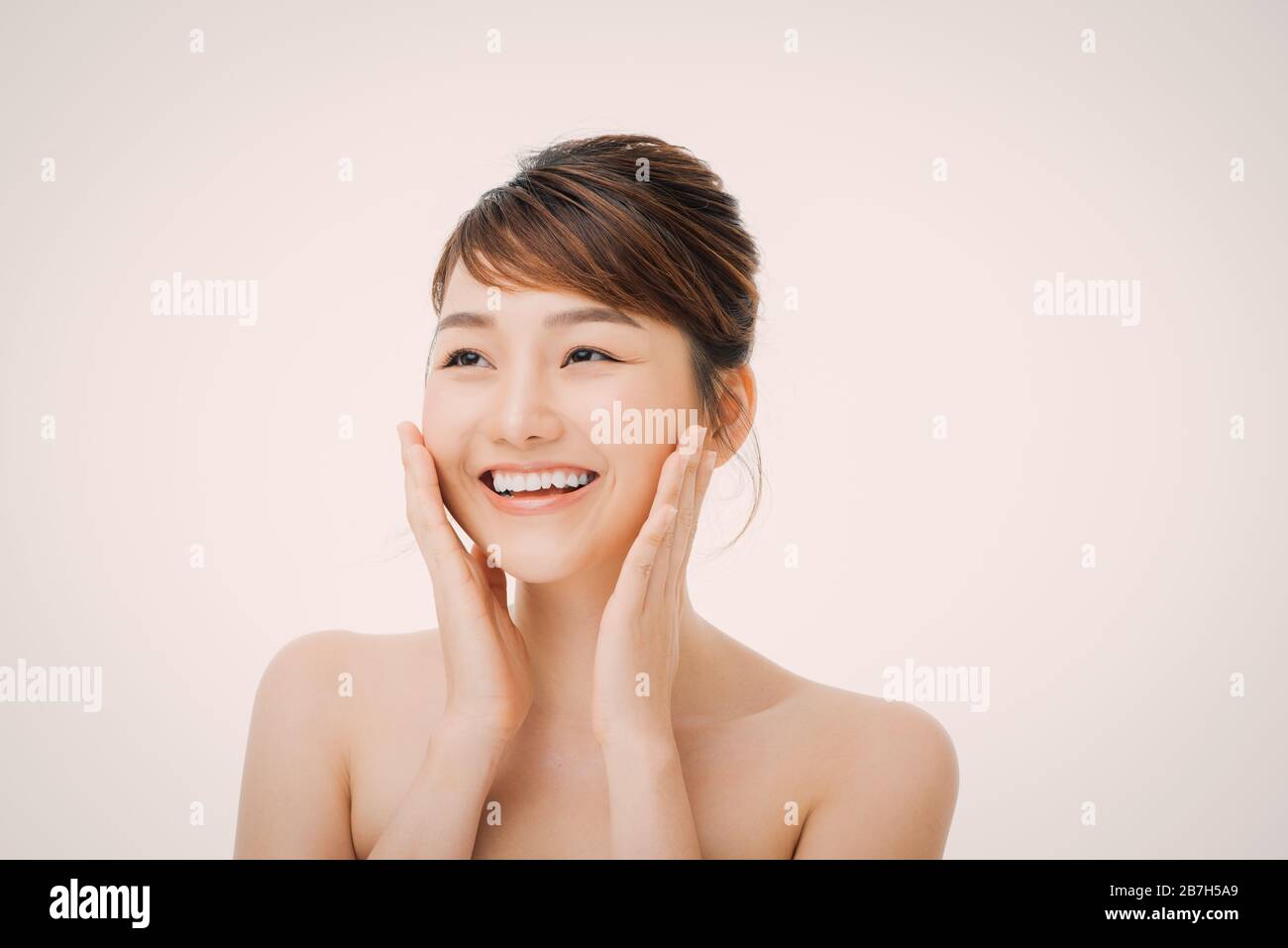 Beautiful Young asian Woman with Clean Fresh Skin look Stock Photo - Alamy