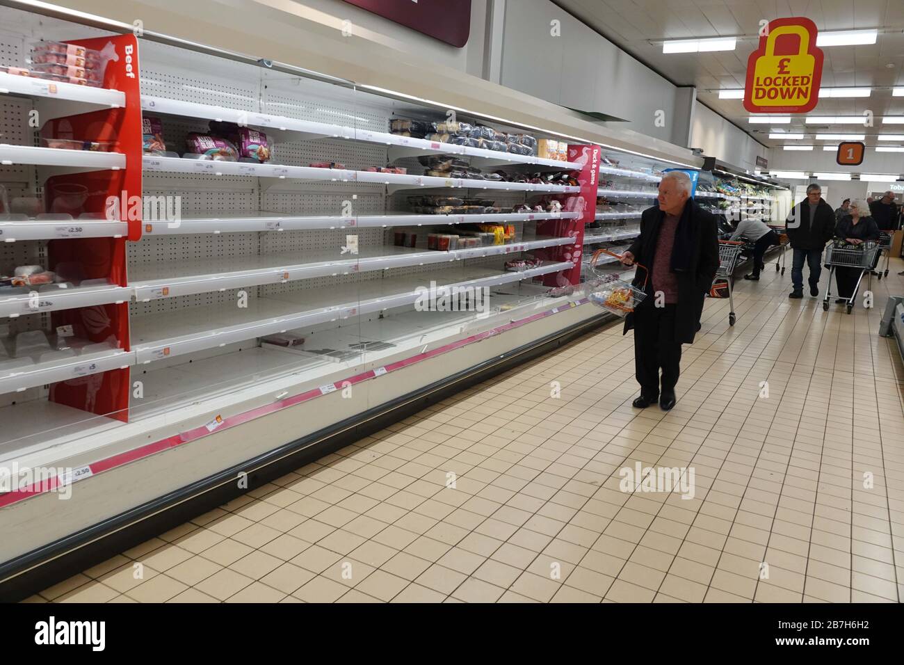 shortages panic buying sainsbury's Stock Photo - Alamy