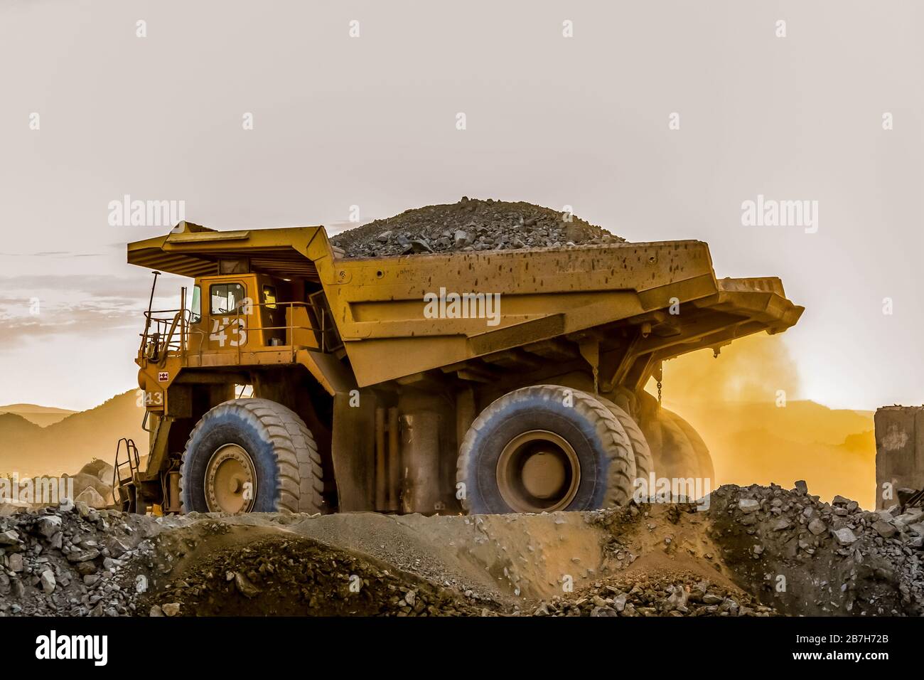 Dump Trucks transporting Platinum ore for processing Stock Photo - Alamy