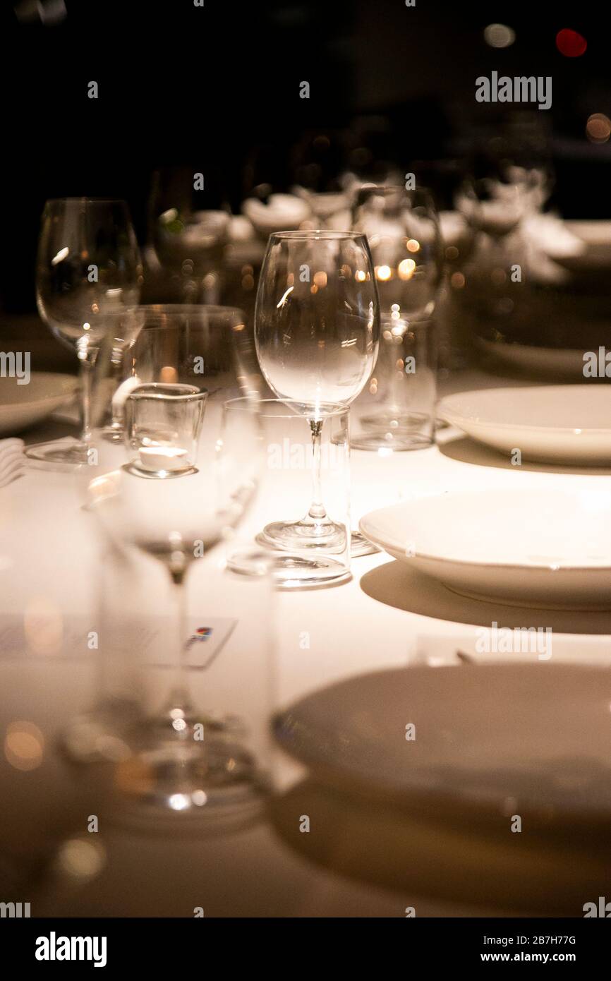 Set up table in a luxury restaurant Stock Photo - Alamy