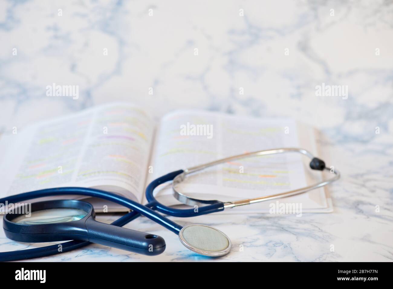 Stethoscope and book Stock Photo - Alamy