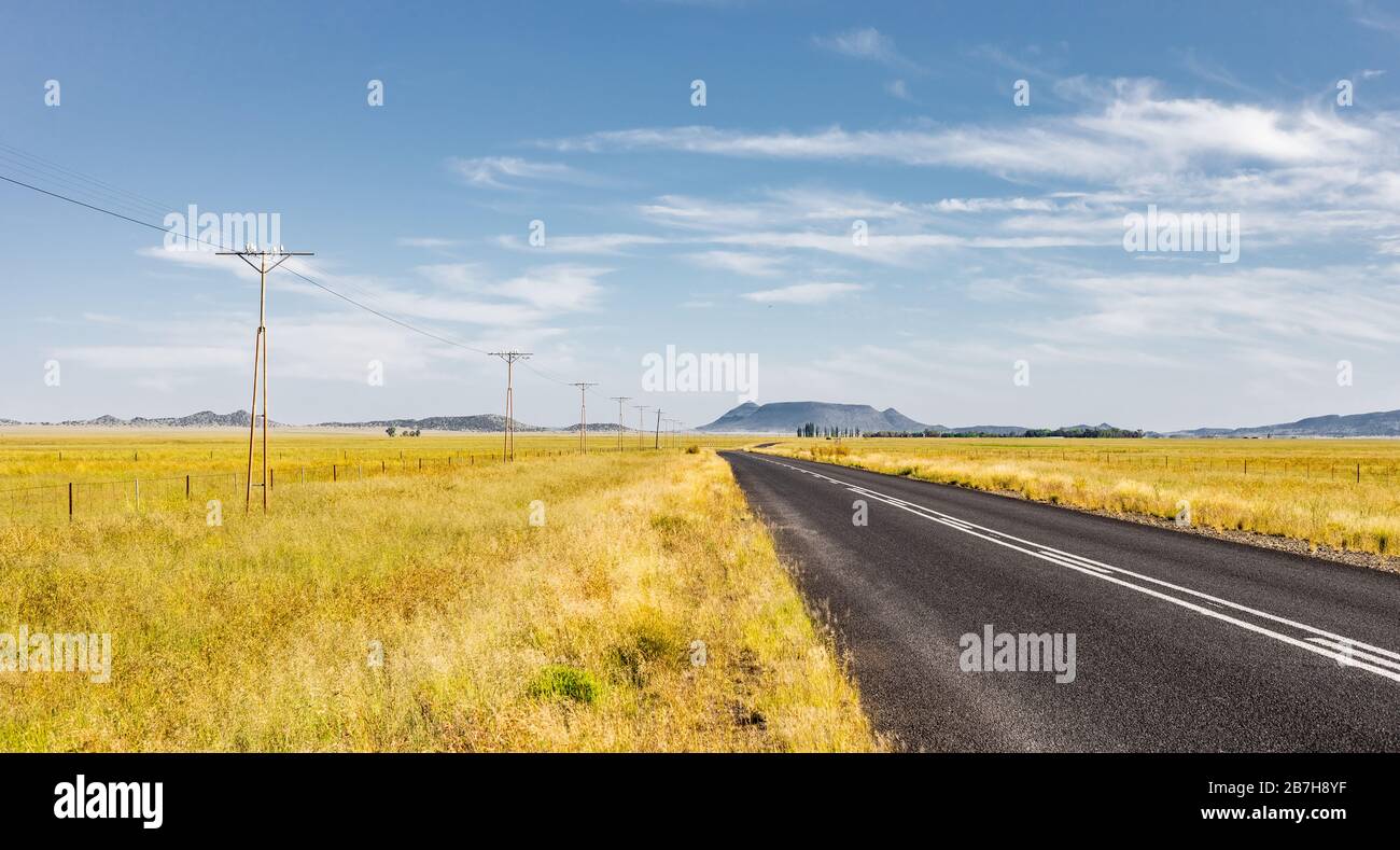 View of an empty country highway road in South African Farmland region ...