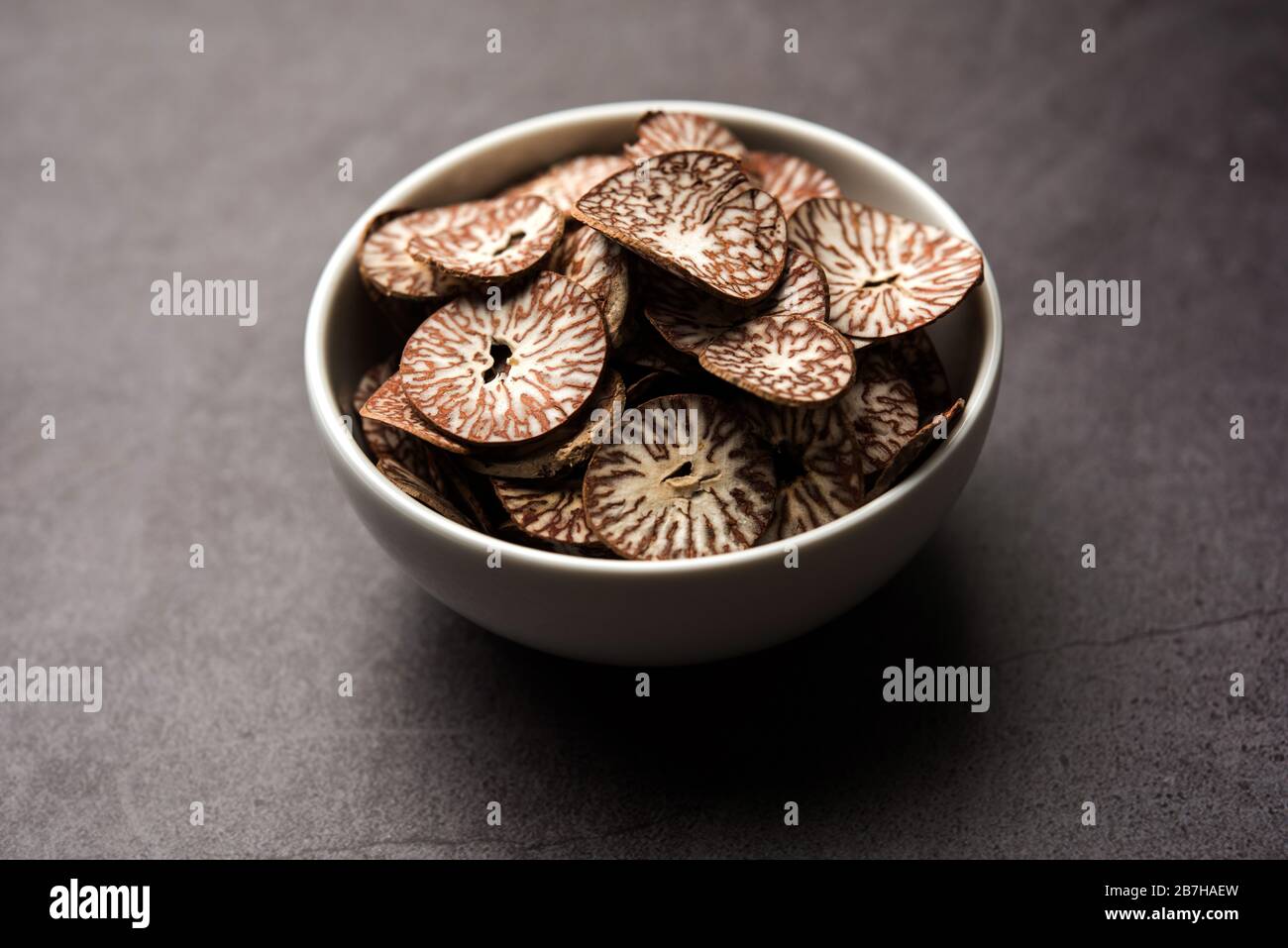 Betel nut chips in a bowl also known as slices of supari in india, used ...