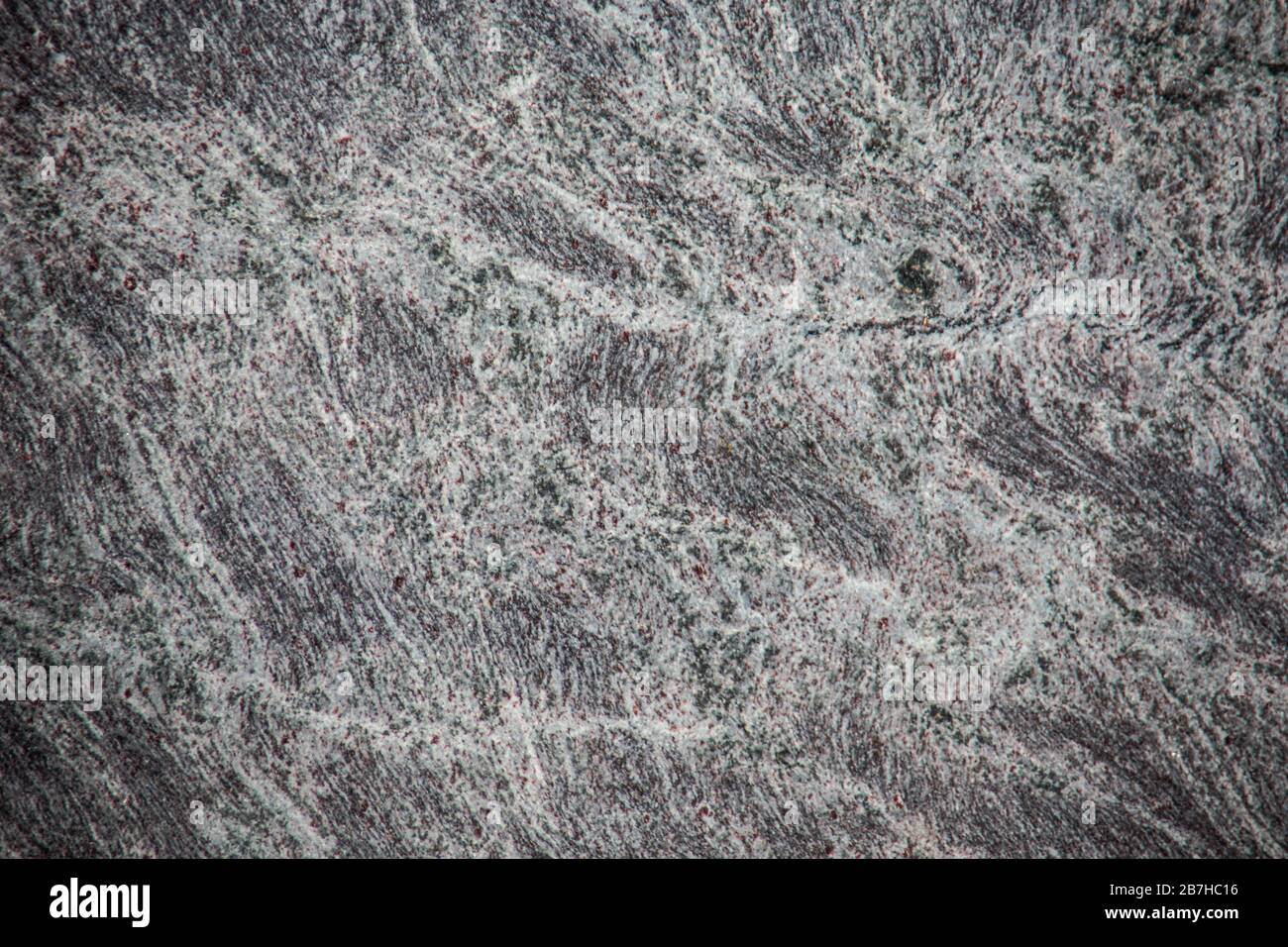 Grains on polished granite as a background Stock Photo - Alamy