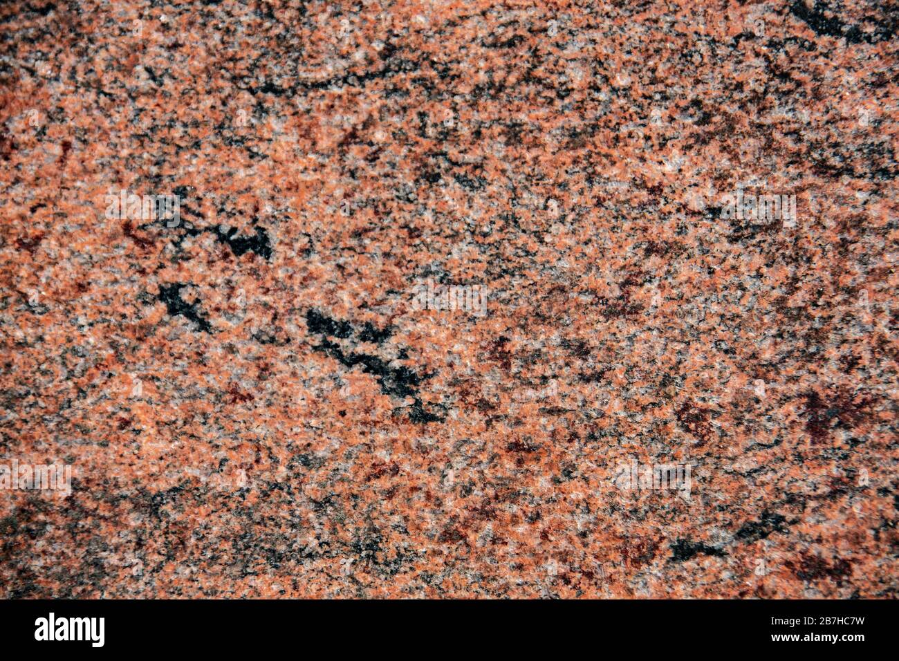 Grains on polished granite as a background Stock Photo - Alamy