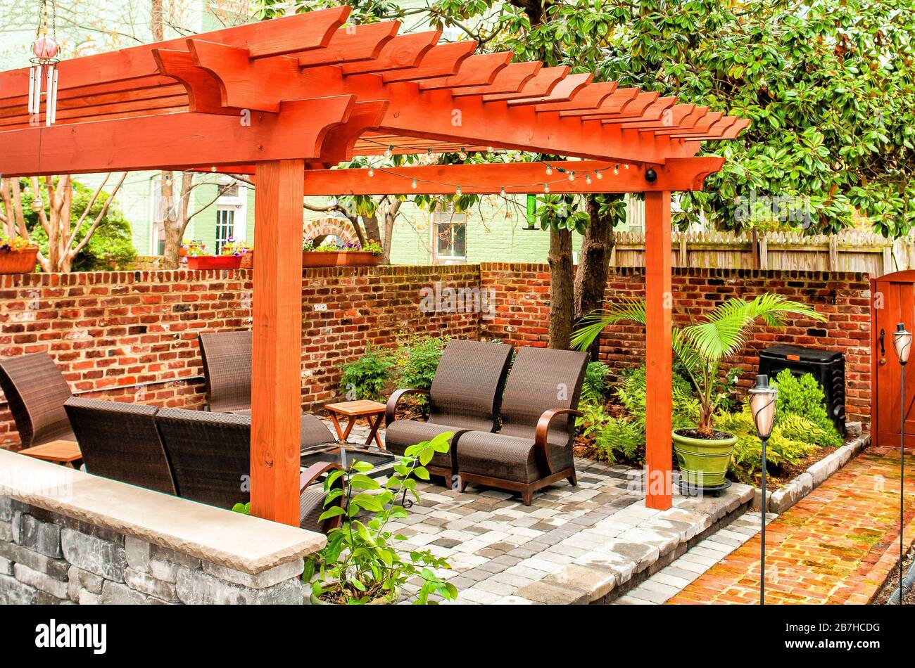 Deck pergola with seating Stock Photo - Alamy