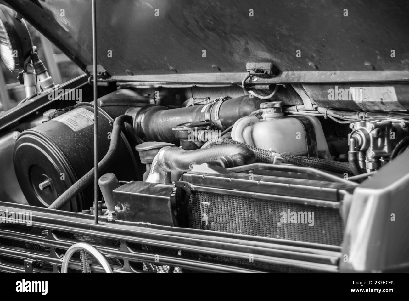 Engine compartment of a truck with machine parts Stock Photo - Alamy