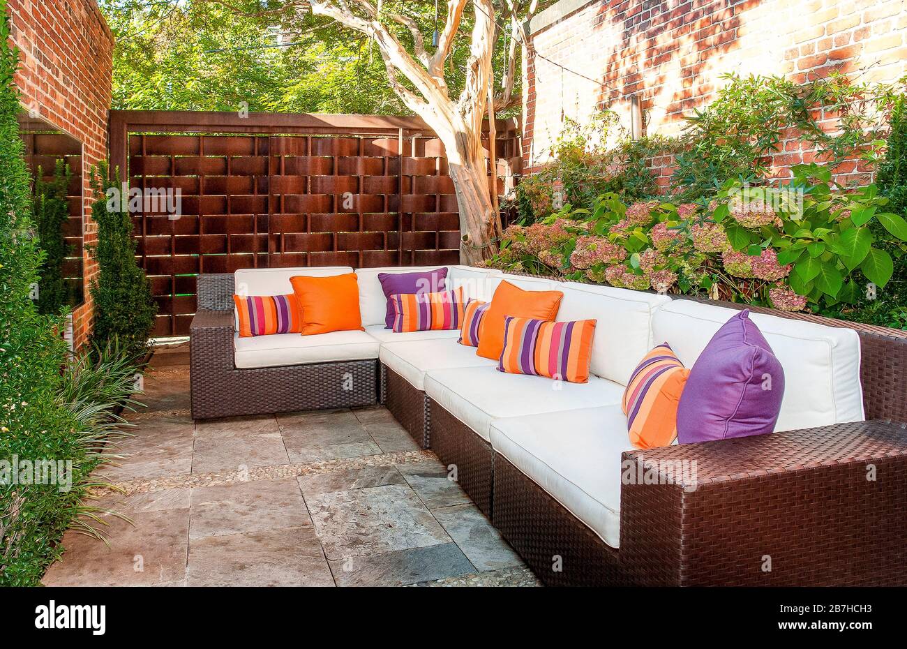 Landscape Design. Outdoor "Room" with large sofa Stock Photo - Alamy