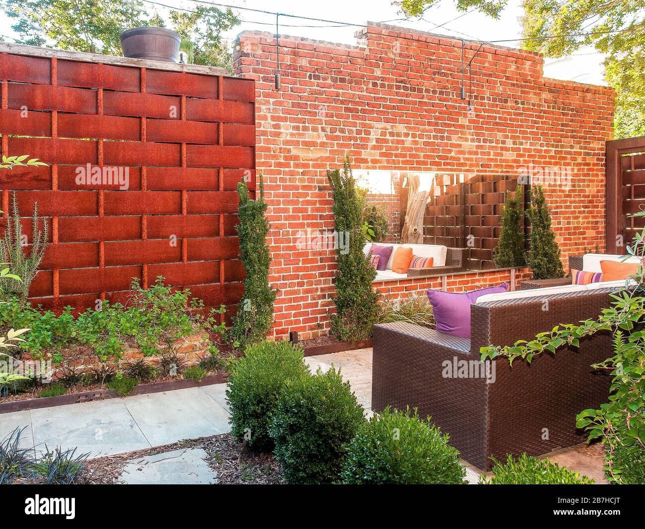 Landscape Design. Outdoor "Room" with large sofa Stock Photo - Alamy