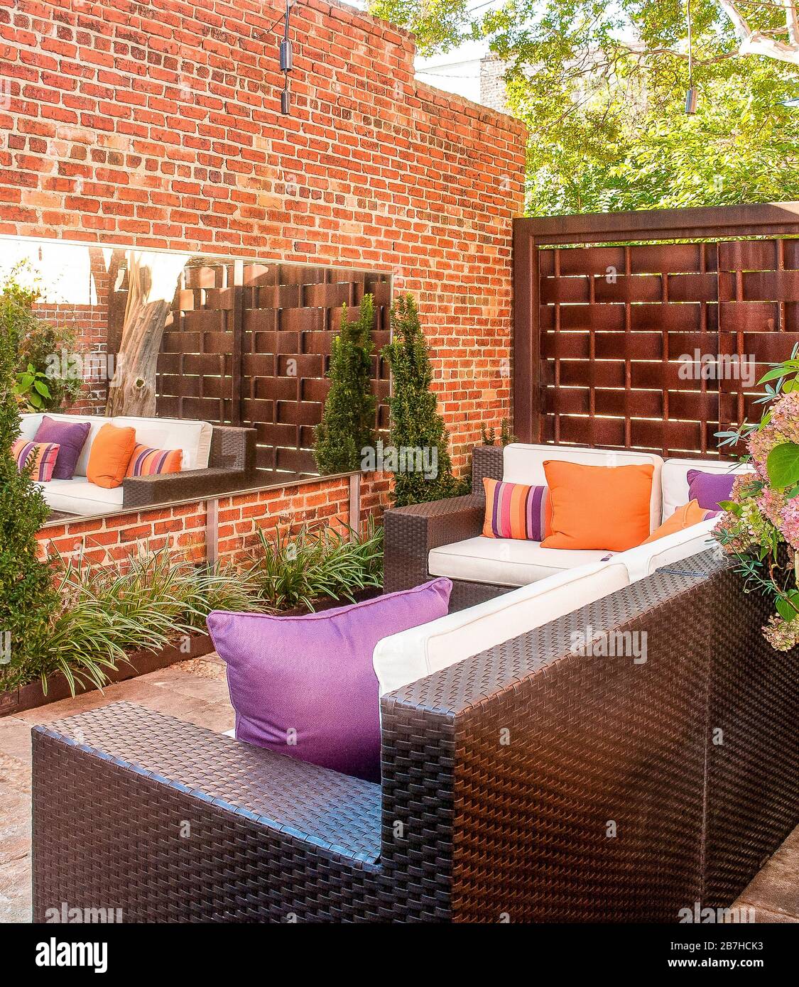 Landscape Design. Outdoor "Room" with large sofa Stock Photo - Alamy