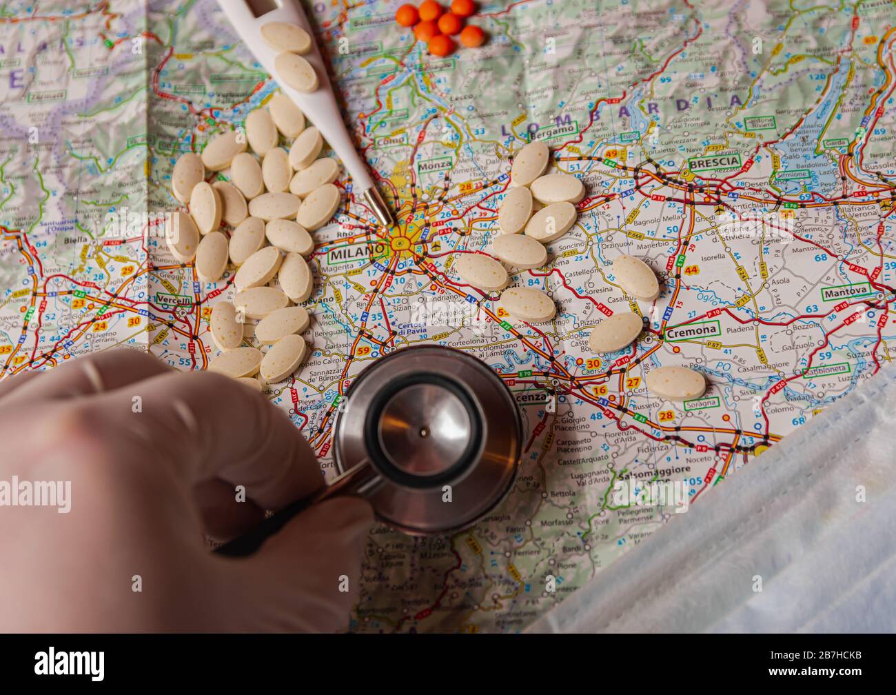 Italian map with pills and medical equipment Stock Photo - Alamy