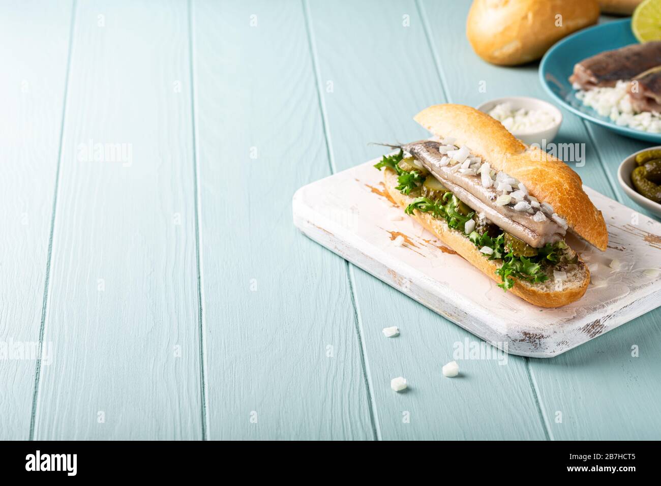Traditional dutch snack, seafood sandwich with herring Stock Photo - Alamy