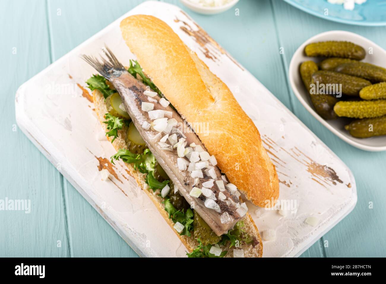 Traditional dutch snack, seafood sandwich with herring Stock Photo - Alamy