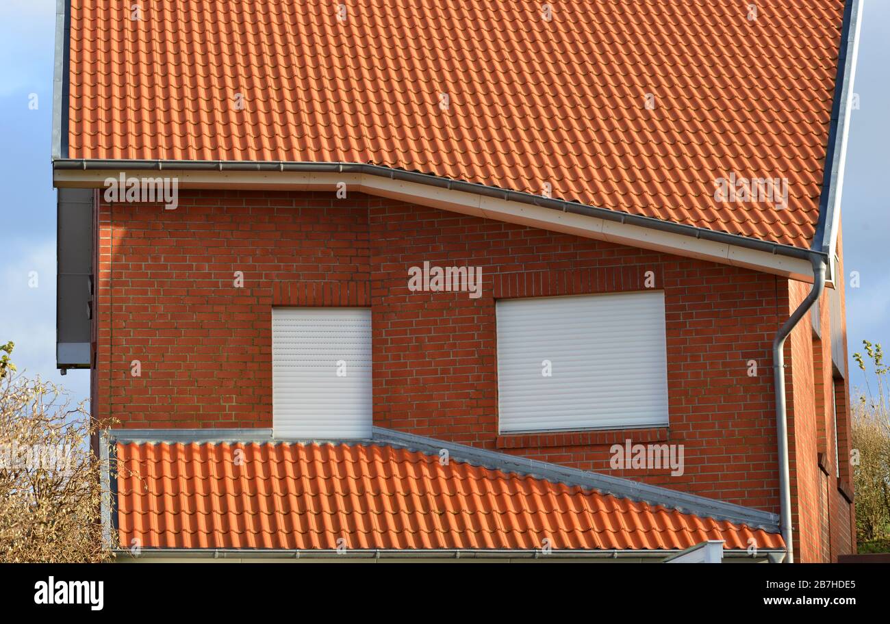 architecture of an brick house with secured windows Stock Photo - Alamy