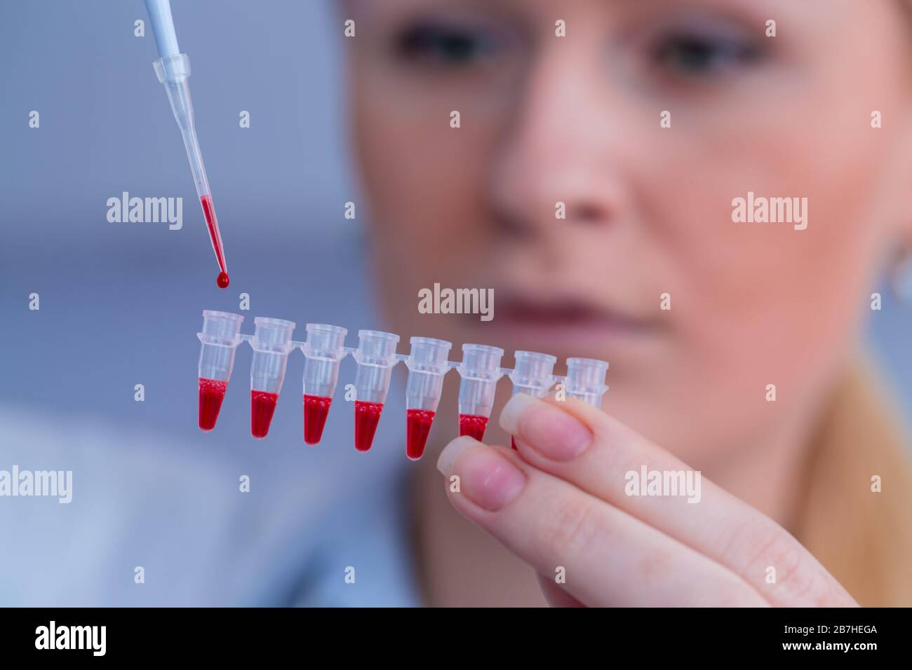 Girl laboratory Assistant works with an antiviral drug in a ...