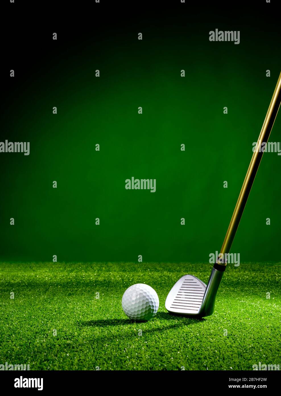 Golf club and golf ball on the turf Stock Photo - Alamy
