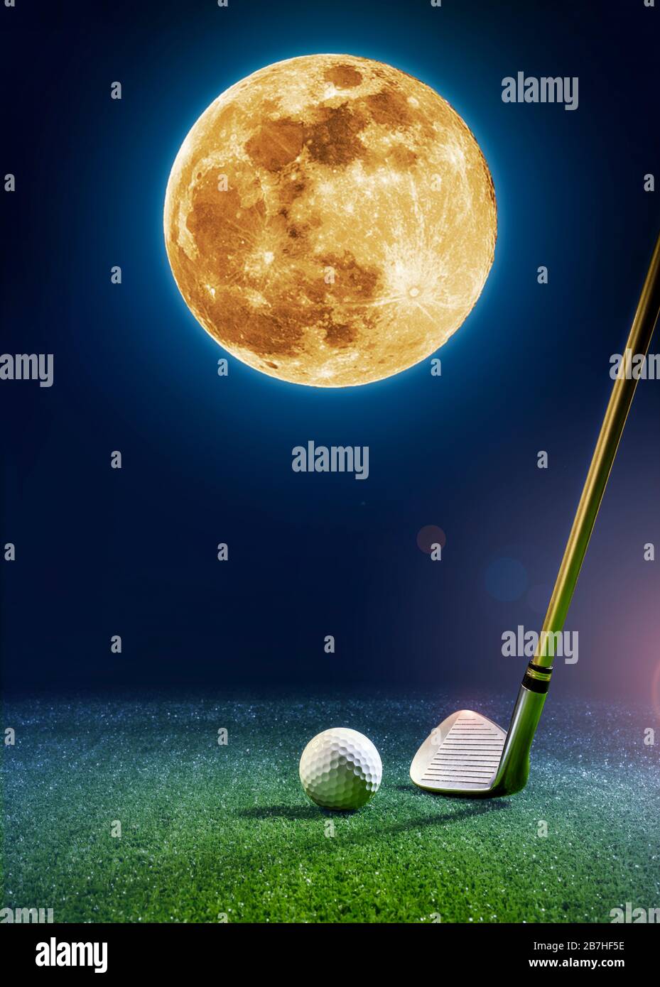 Golf club and golf ball on the turf Stock Photo - Alamy