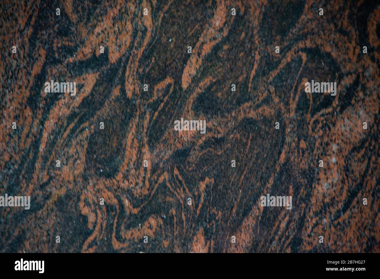 Grains on polished granite as a background Stock Photo - Alamy
