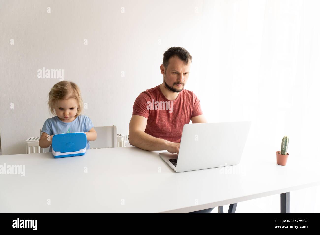 Male child care worker hi-res stock photography and images - Alamy