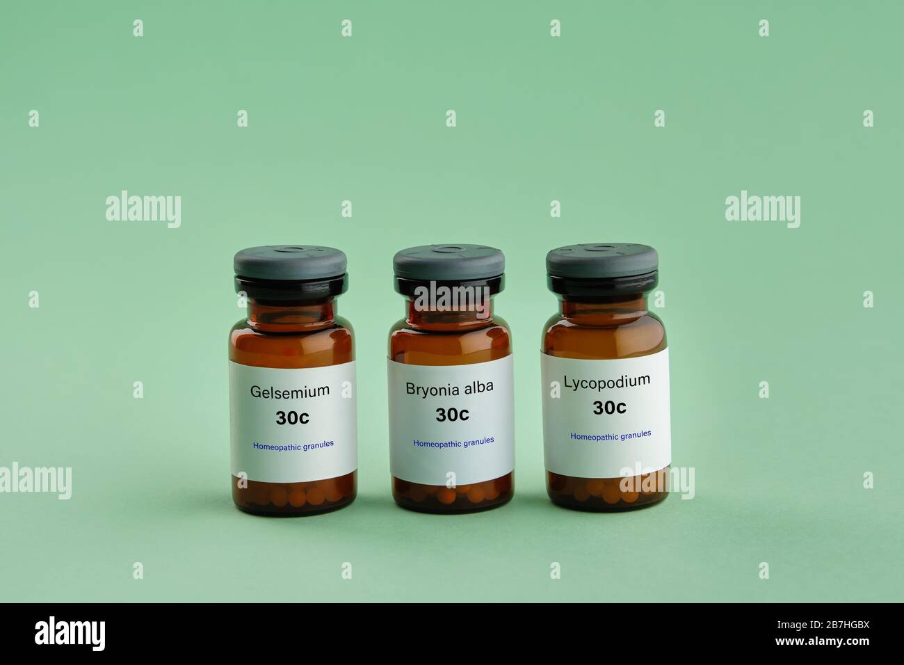Bottles of homeopathic drugs - Gelsemium, Bryonia alba, Lycopodium ...