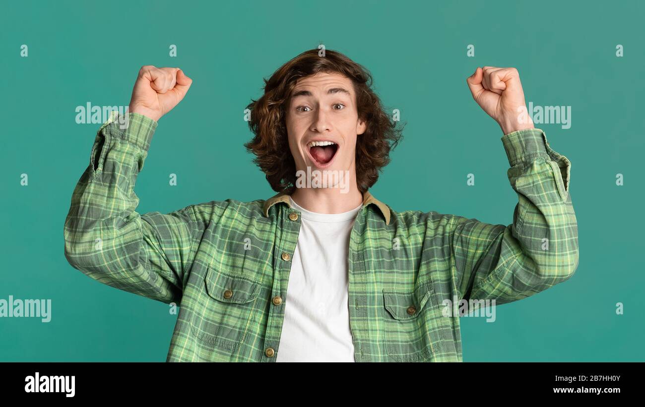 Teenager guy triumphant hi-res stock photography and images - Alamy