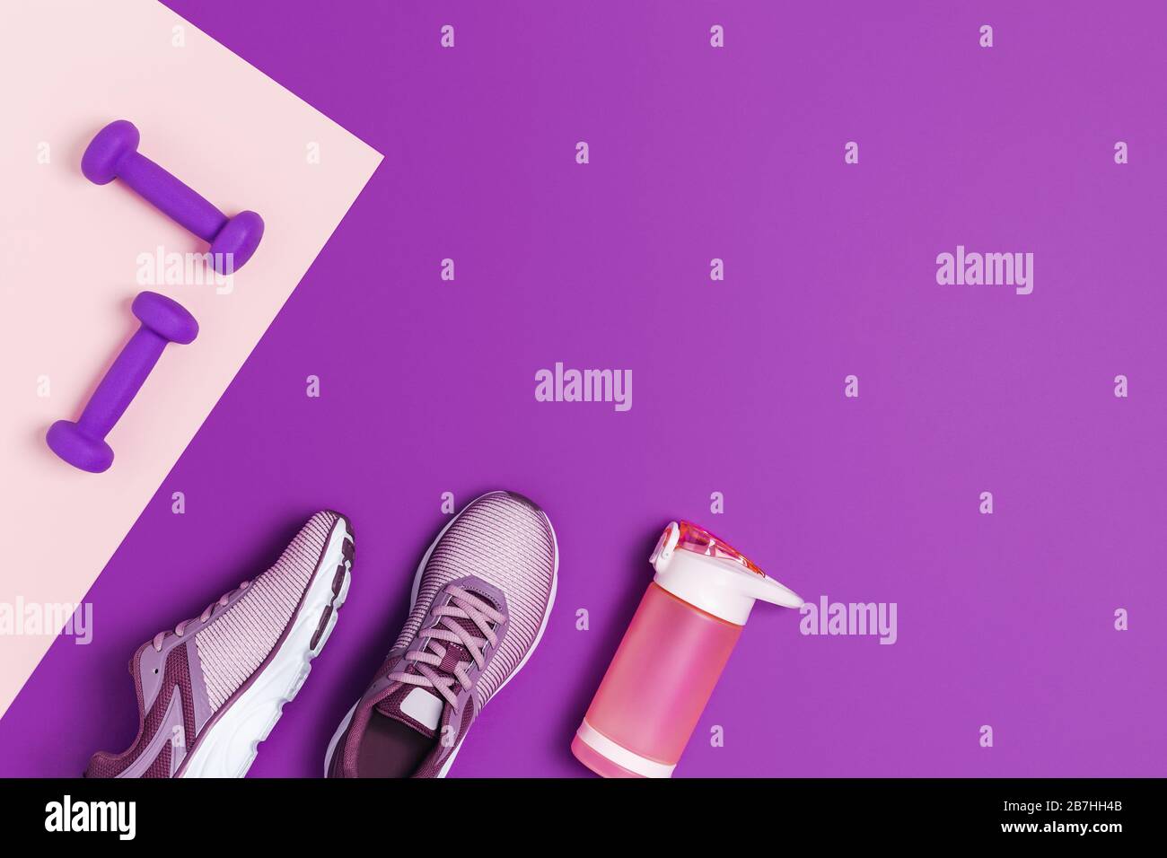 Sports equipment for women's training. Pink-purple background, diagonal ...