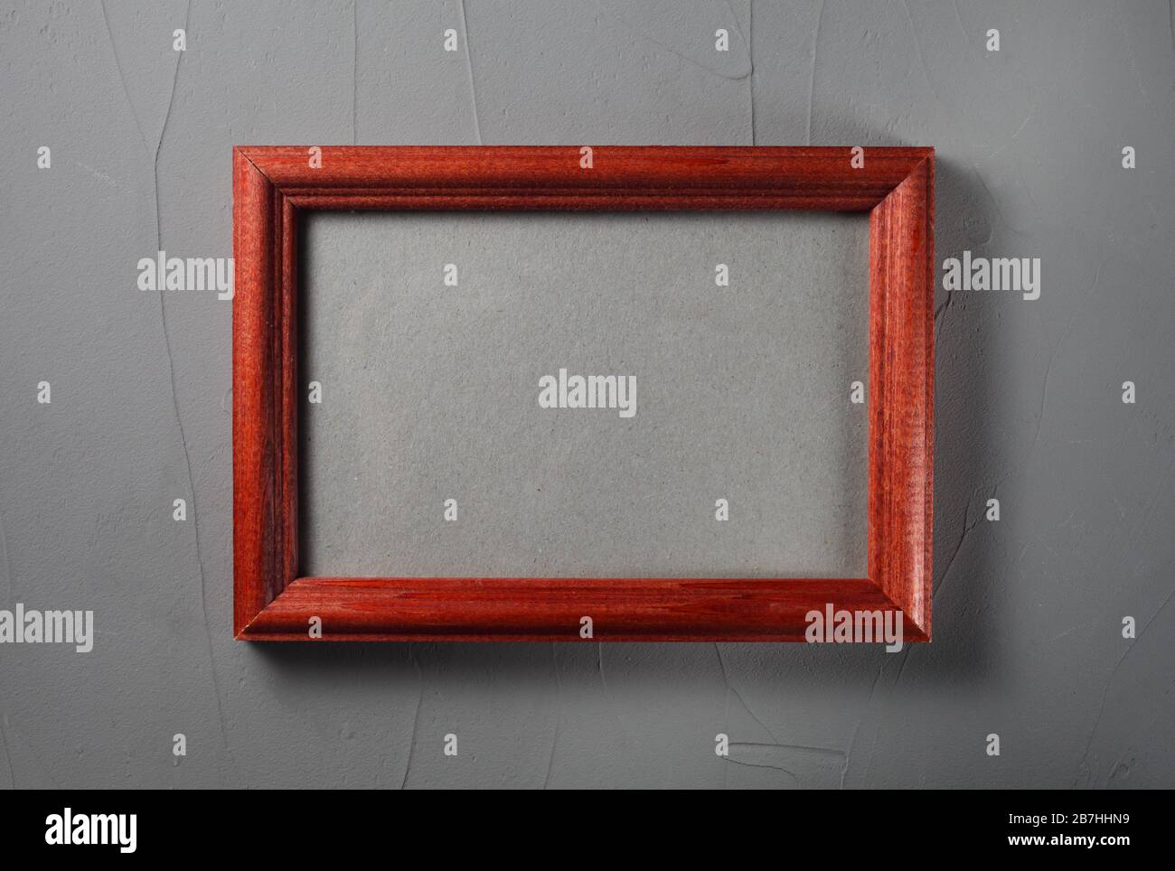 photo frame on a light concrete wall Stock Photo - Alamy