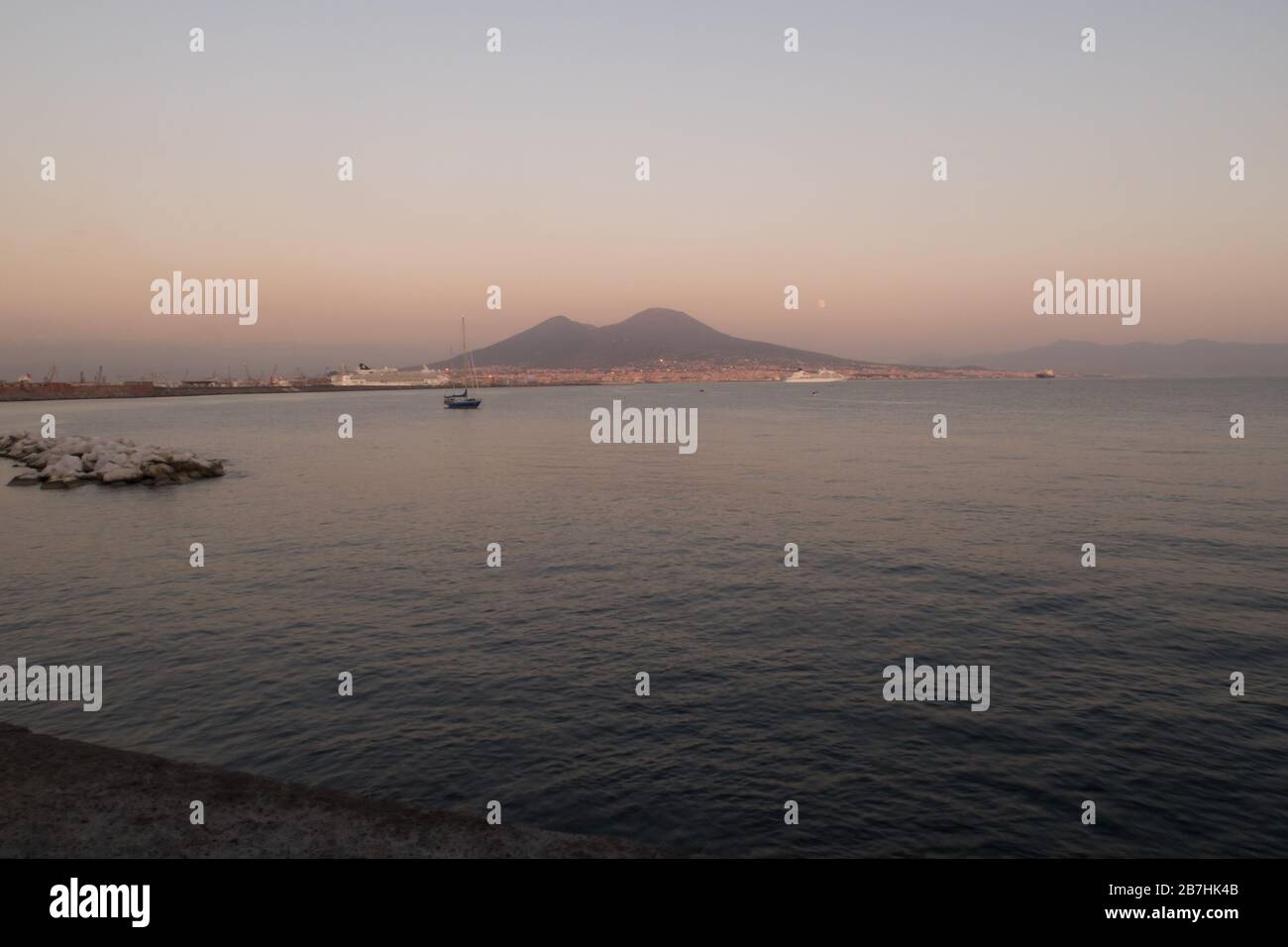 The moon rising behind Mount Vesuvio in Naples, Italy Stock Photo - Alamy