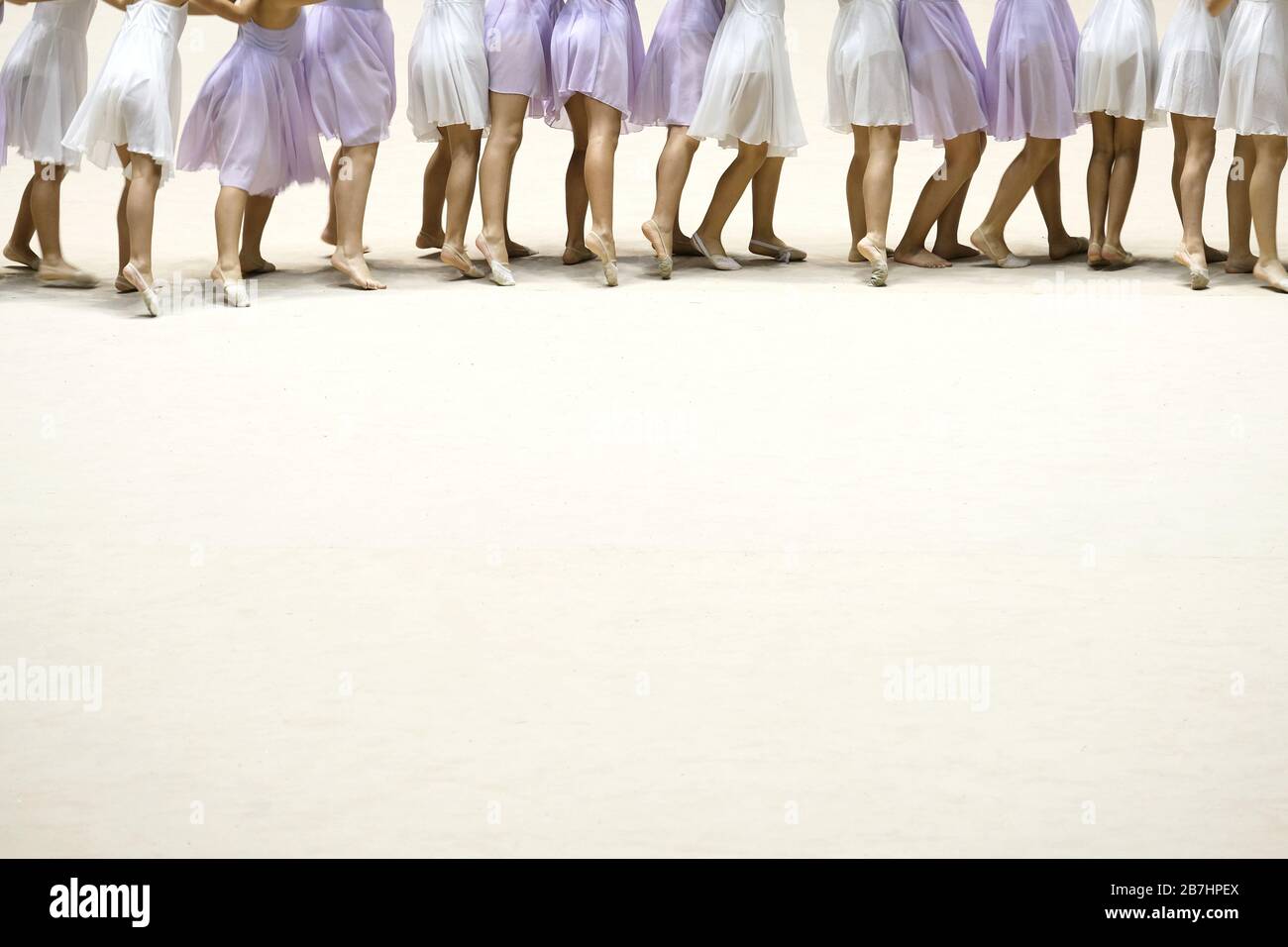 Row of young dancers legs Stock Photo - Alamy