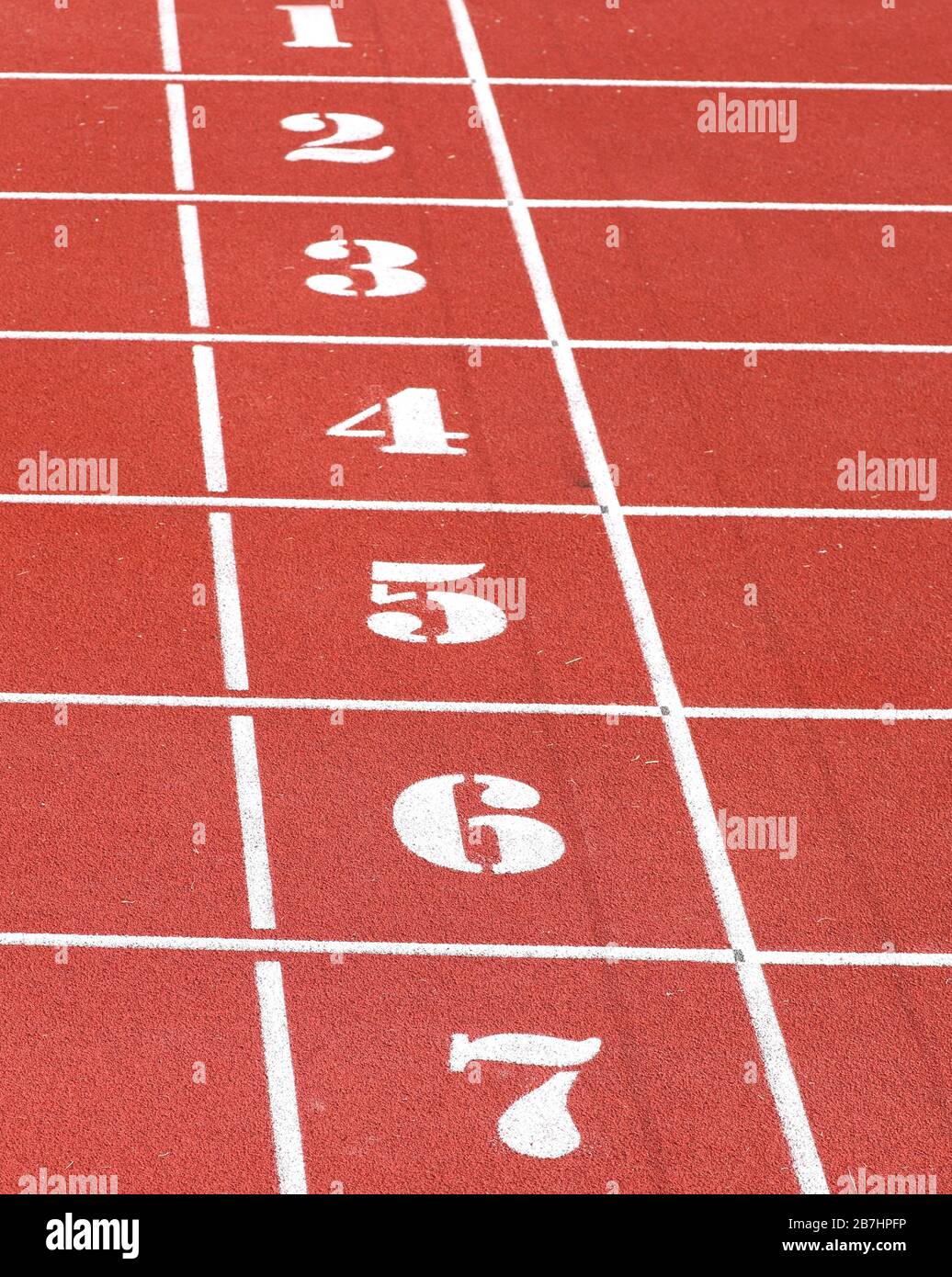 numbers from one to seven of the athletics track lane before the speed ...