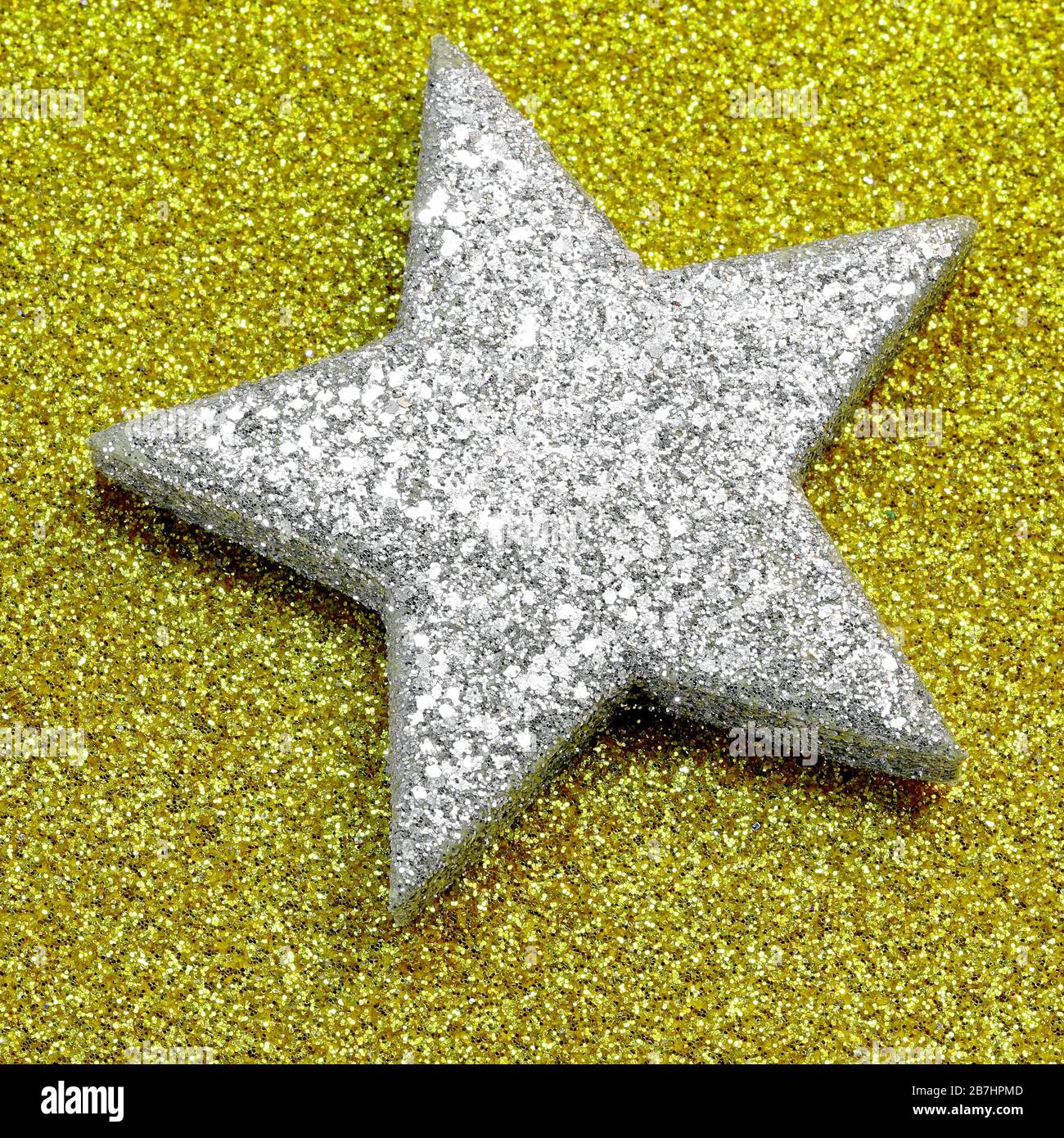 one big Silver Star on the glitter golden background Stock Photo - Alamy