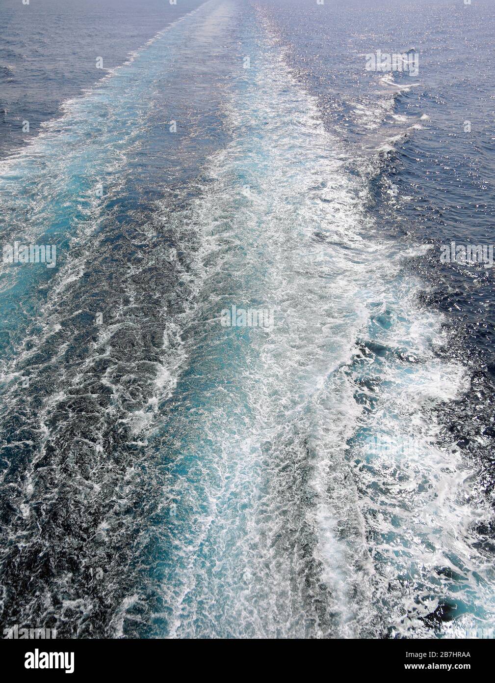 foam trail on the sea left by the cruise ship during the crossing Stock ...