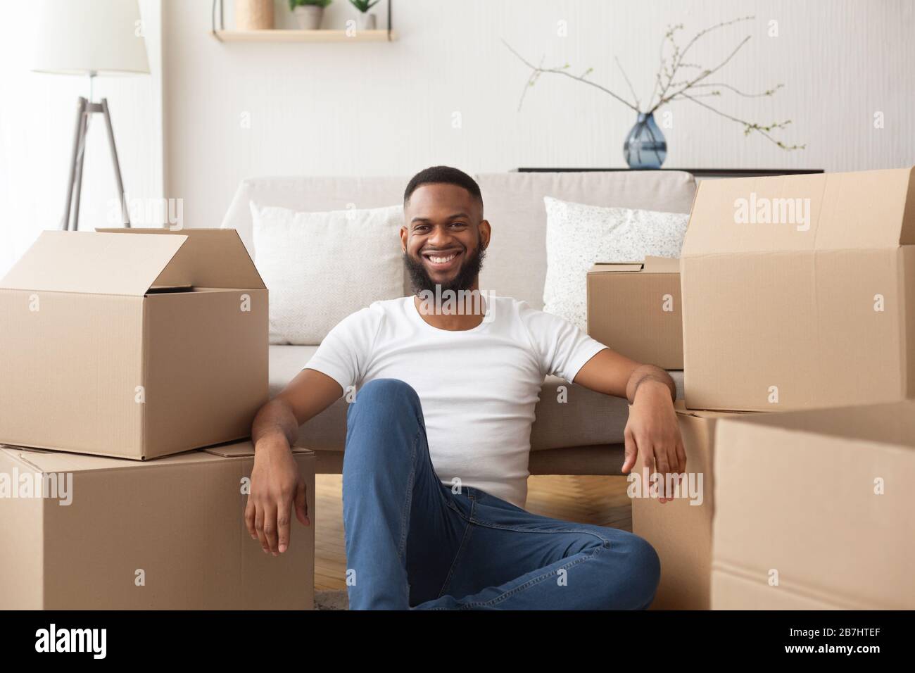 Delivery guy sitting hi-res stock photography and images - Alamy