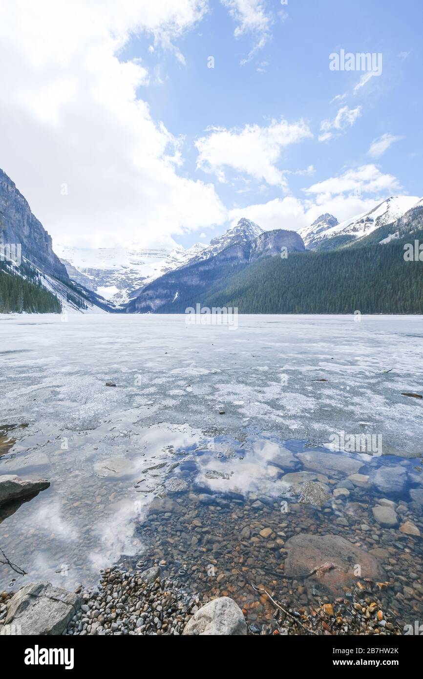 Mount fairview, partly frozen lake, Lake Louise Banff National Park ...