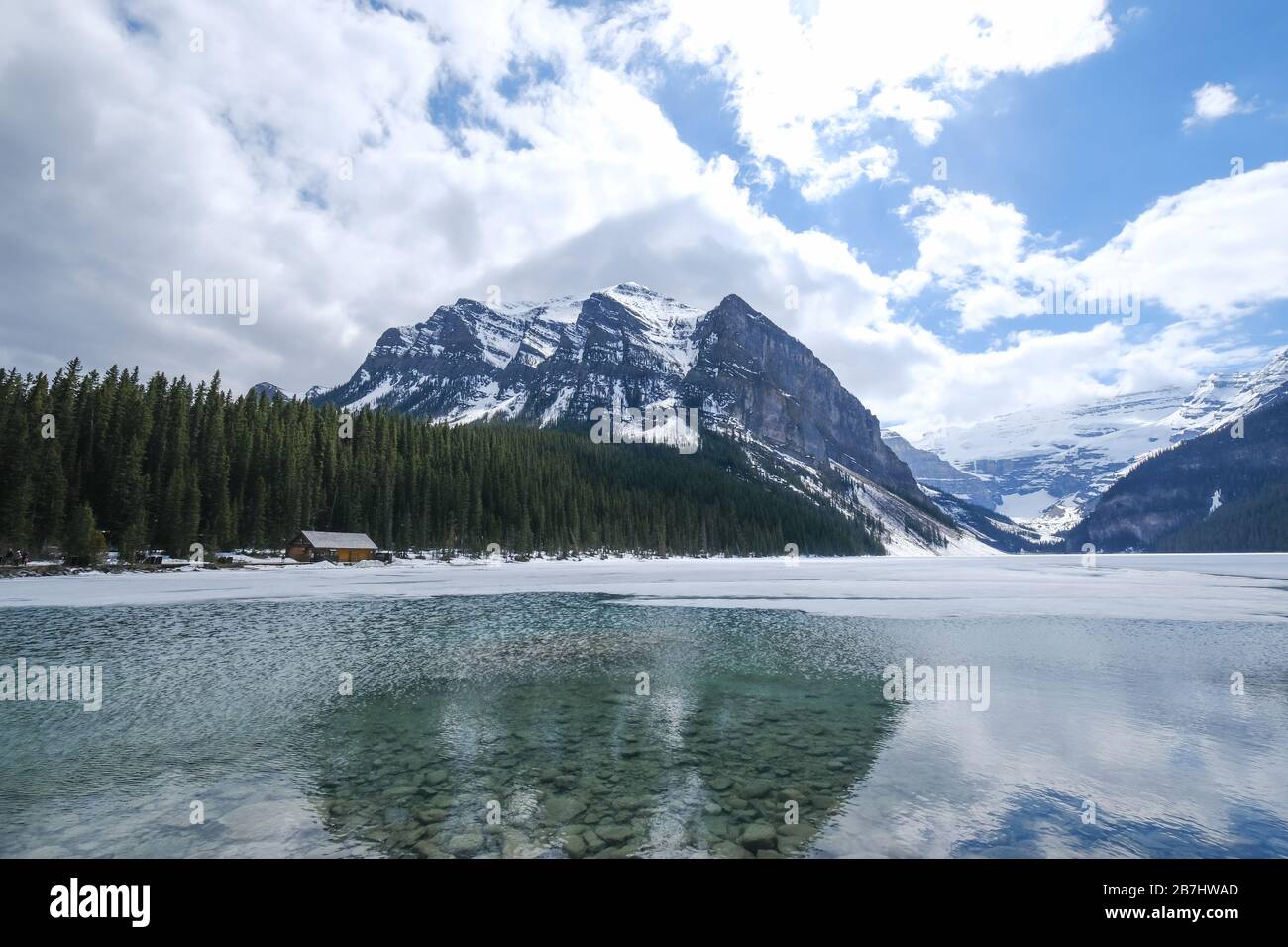 Mount fairview, partly frozen lake, Lake Louise Banff National Park ...