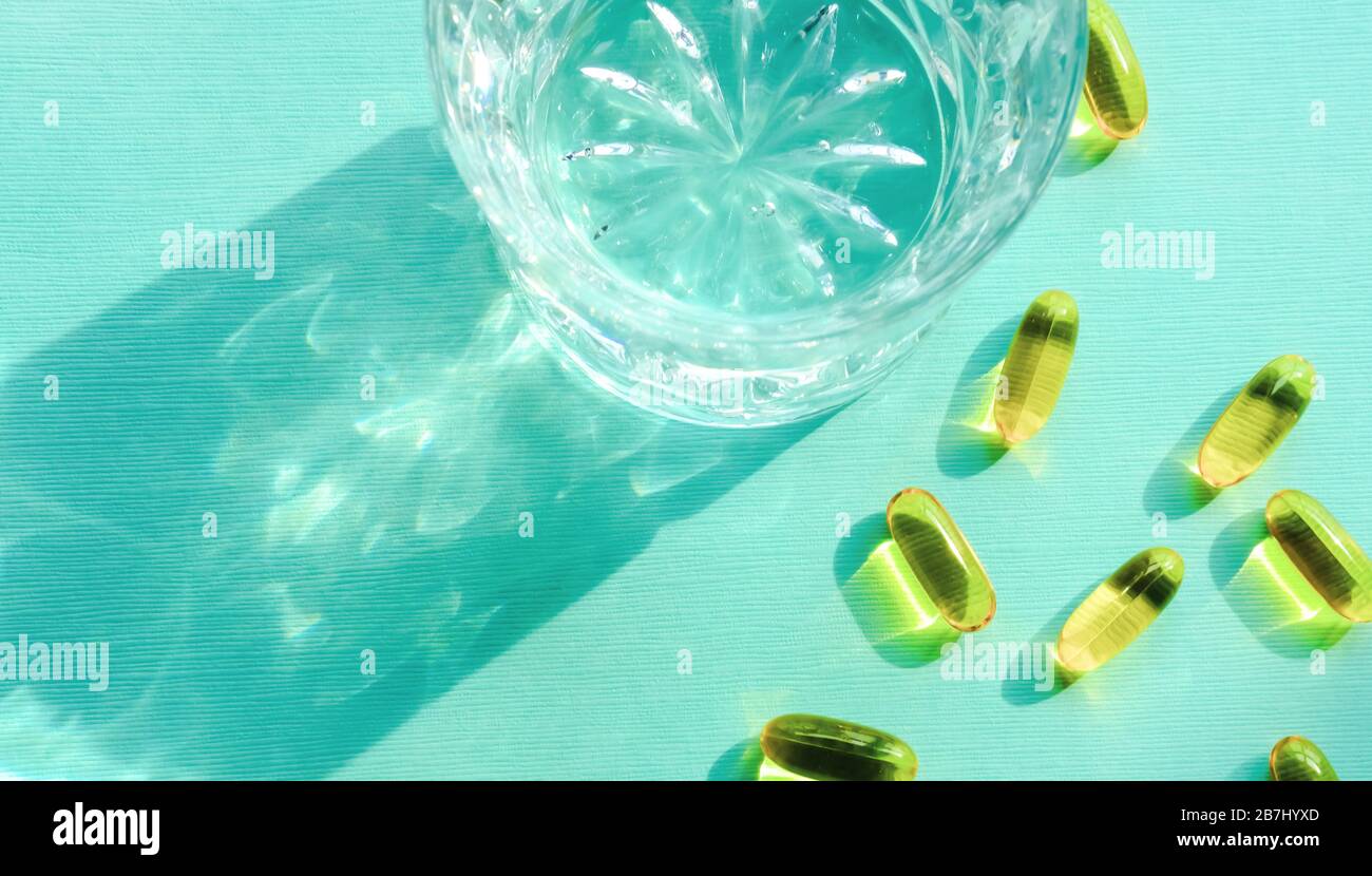 Capsules and water Stock Photo - Alamy