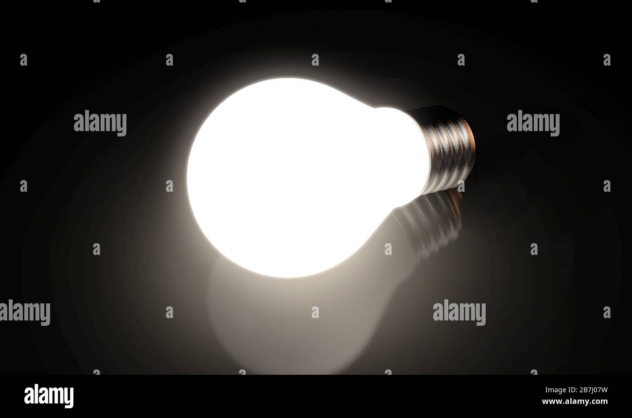 A concept of a disconnected standard light bulb brightly illuminated on ...