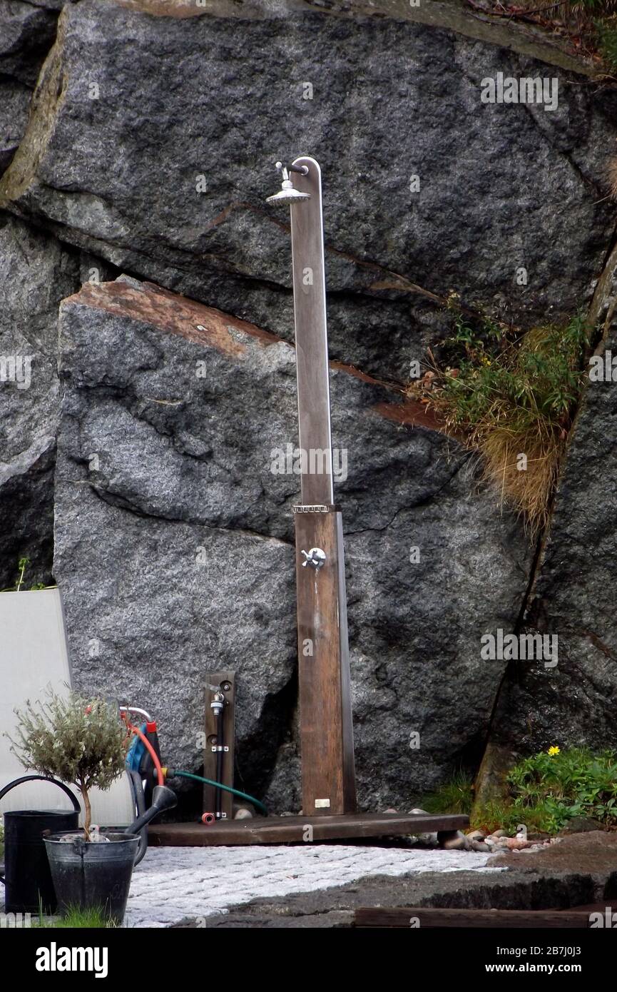 Shower post and a wash at the fjord Stock Photo - Alamy