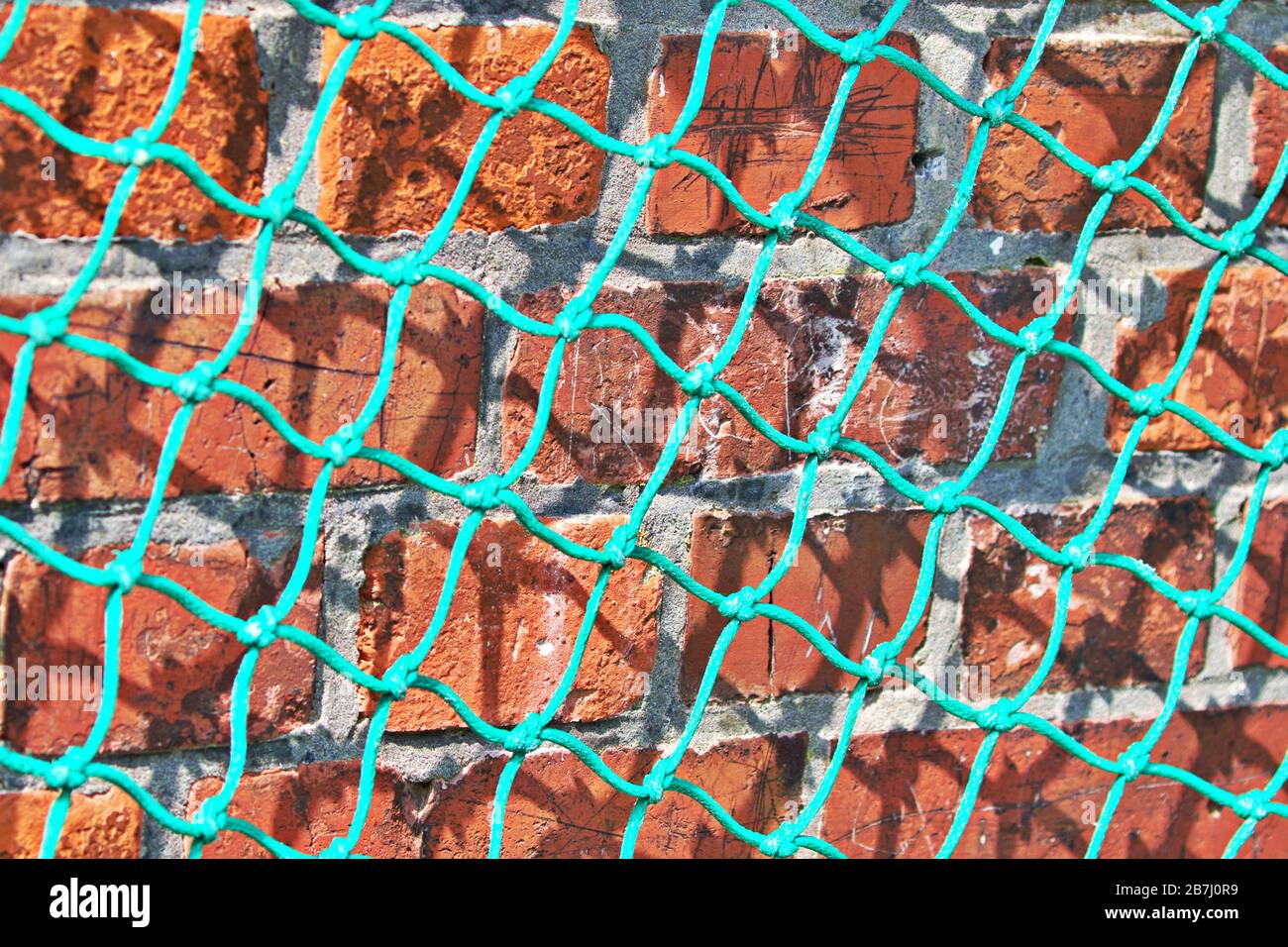 fishing net at wall Stock Photo - Alamy