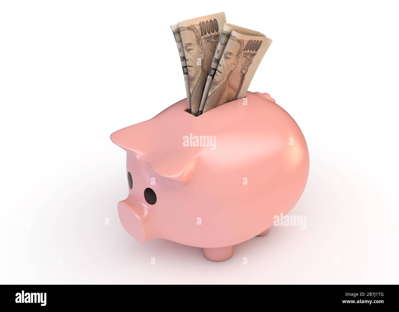 A pink piggy bank with a rolled up pair of japan yen bank notes ...