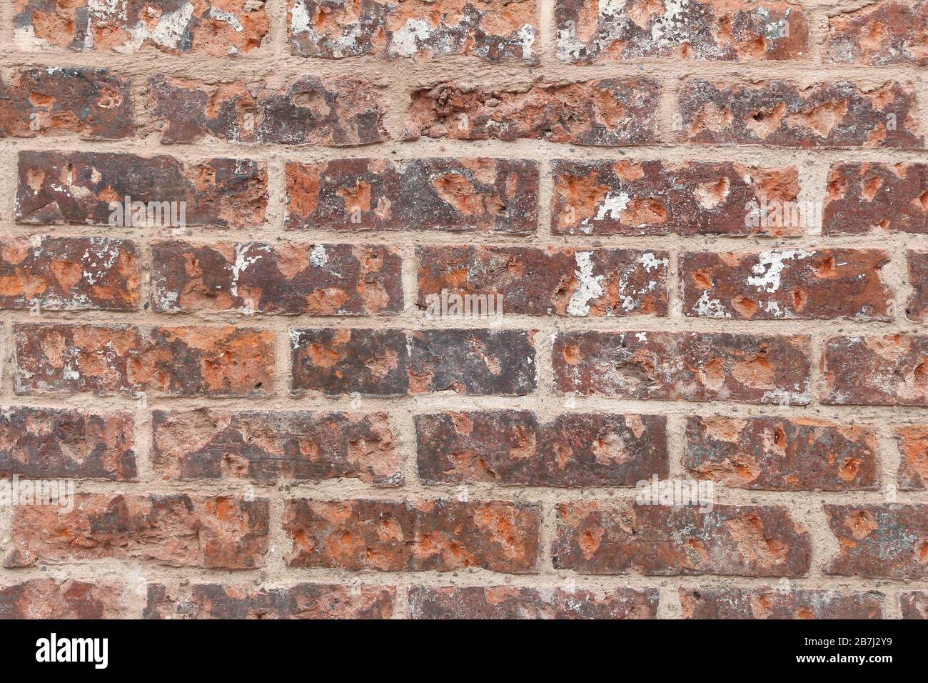 Red aged brick wall texture. Building background Stock Photo - Alamy