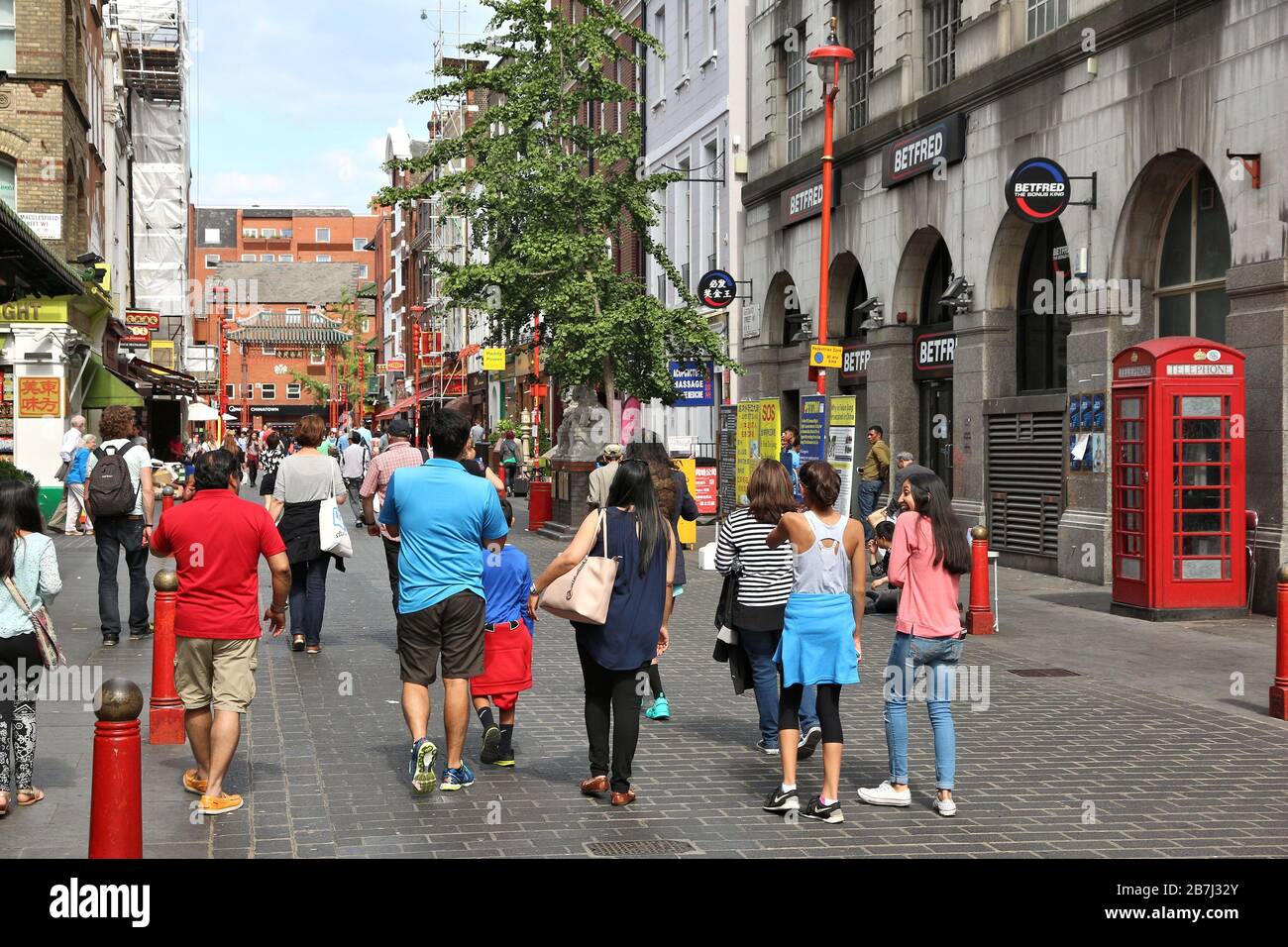 LONDON, UK - JULY 6, 2016: People visit Chinatown district of London ...