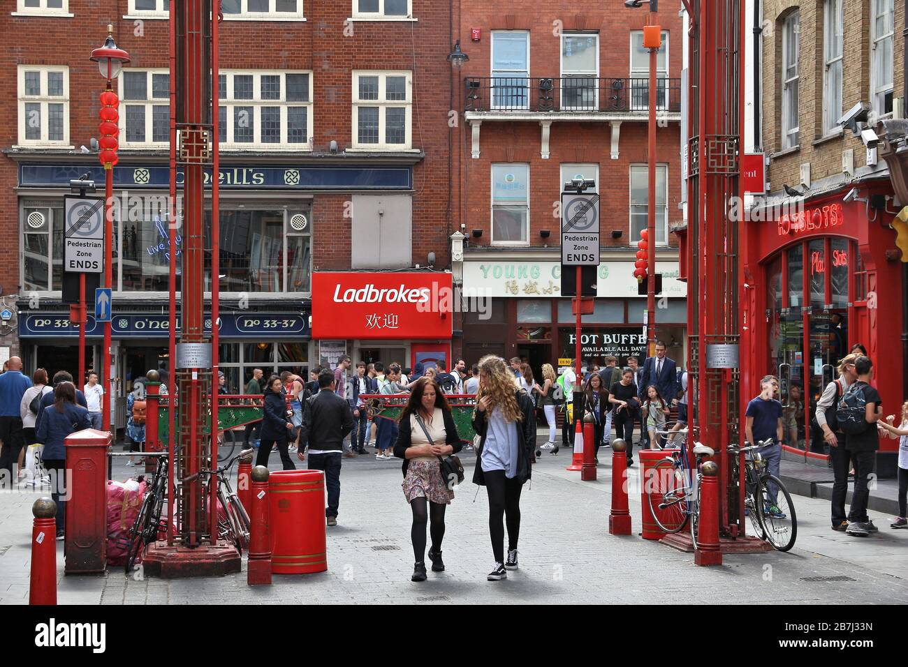 LONDON, UK - JULY 6, 2016: People visit Chinatown district of London ...