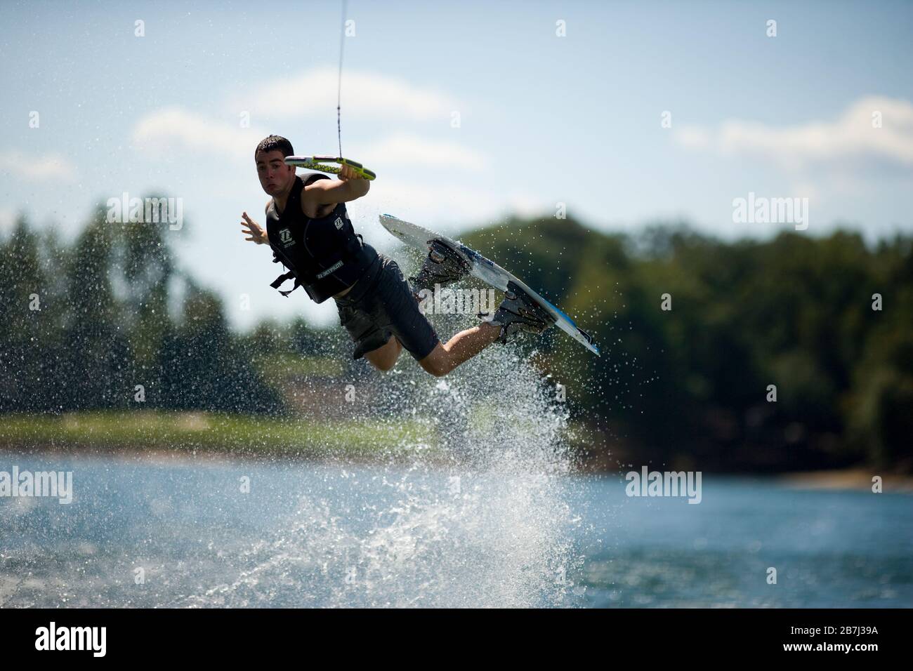 Young man wakeboarding Stock Photo - Alamy