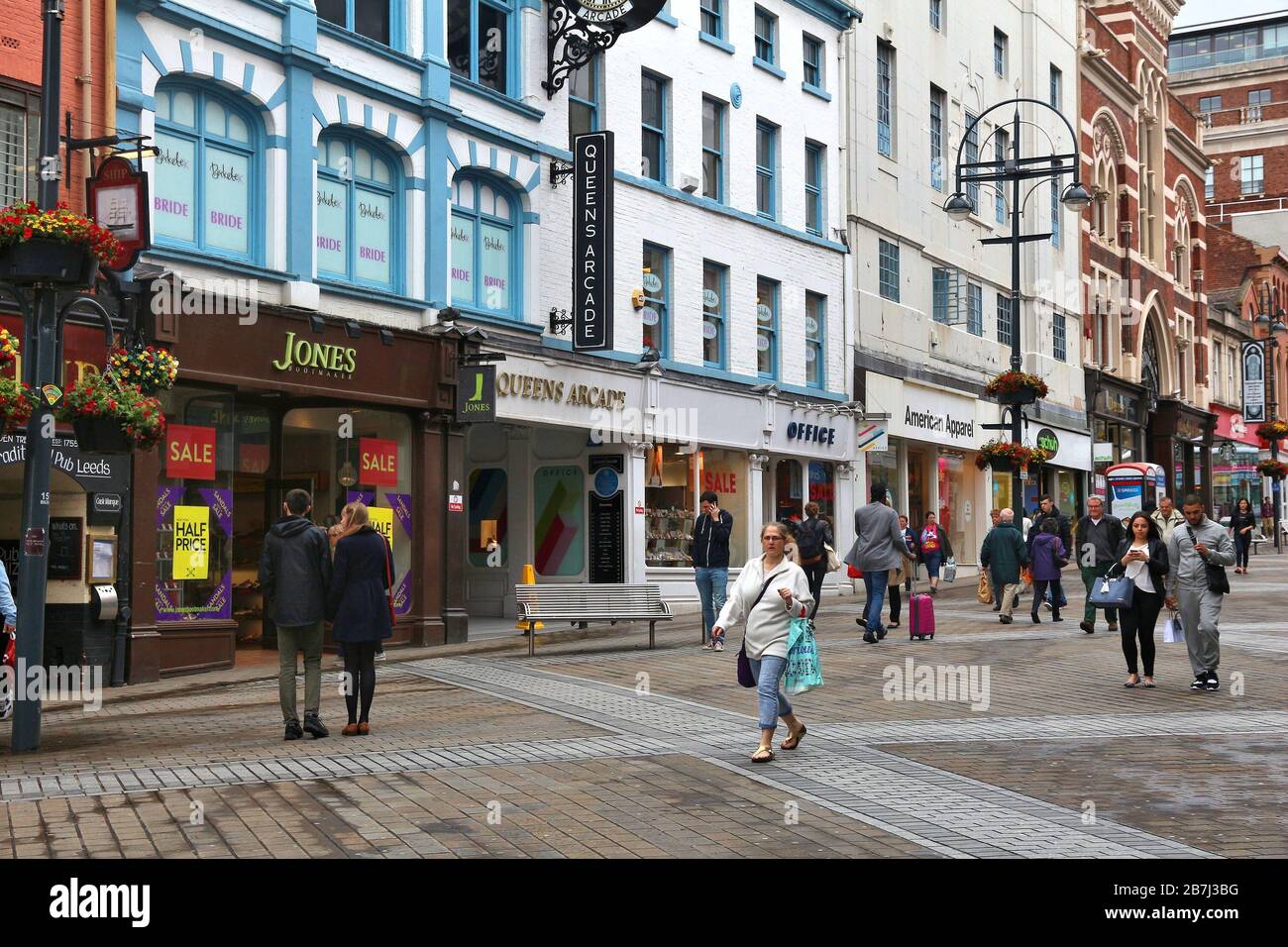LEEDS, UK - JULY 11, 2016: People shop at Briggate street in downtown ...