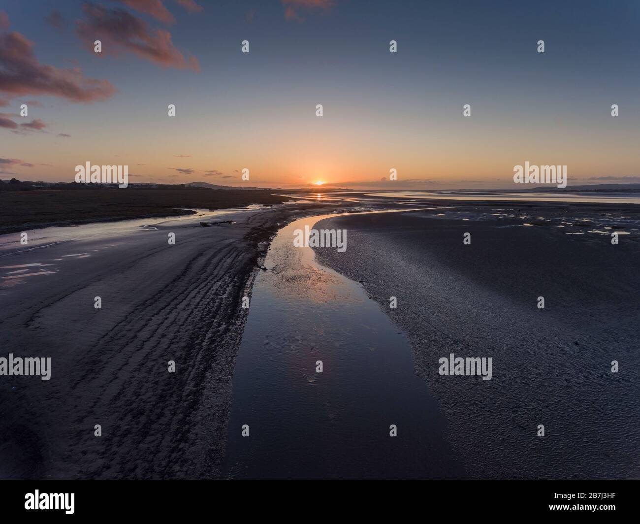 A river in the mud at the Loughor estuary Stock Photo - Alamy