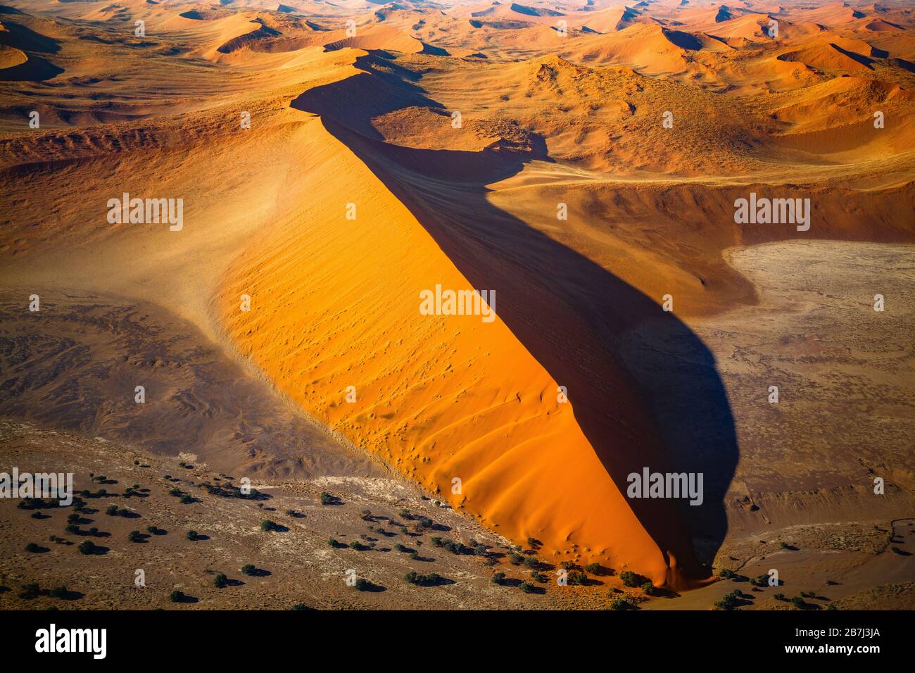 Sand dunes of Namib desert from aircraft on Skeleton coast in Namibia ...