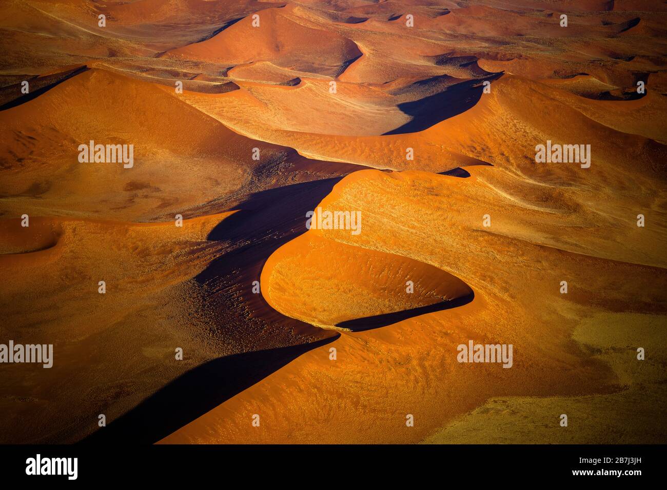 Sand dunes of Namib desert from aircraft on Skeleton coast in Namibia ...