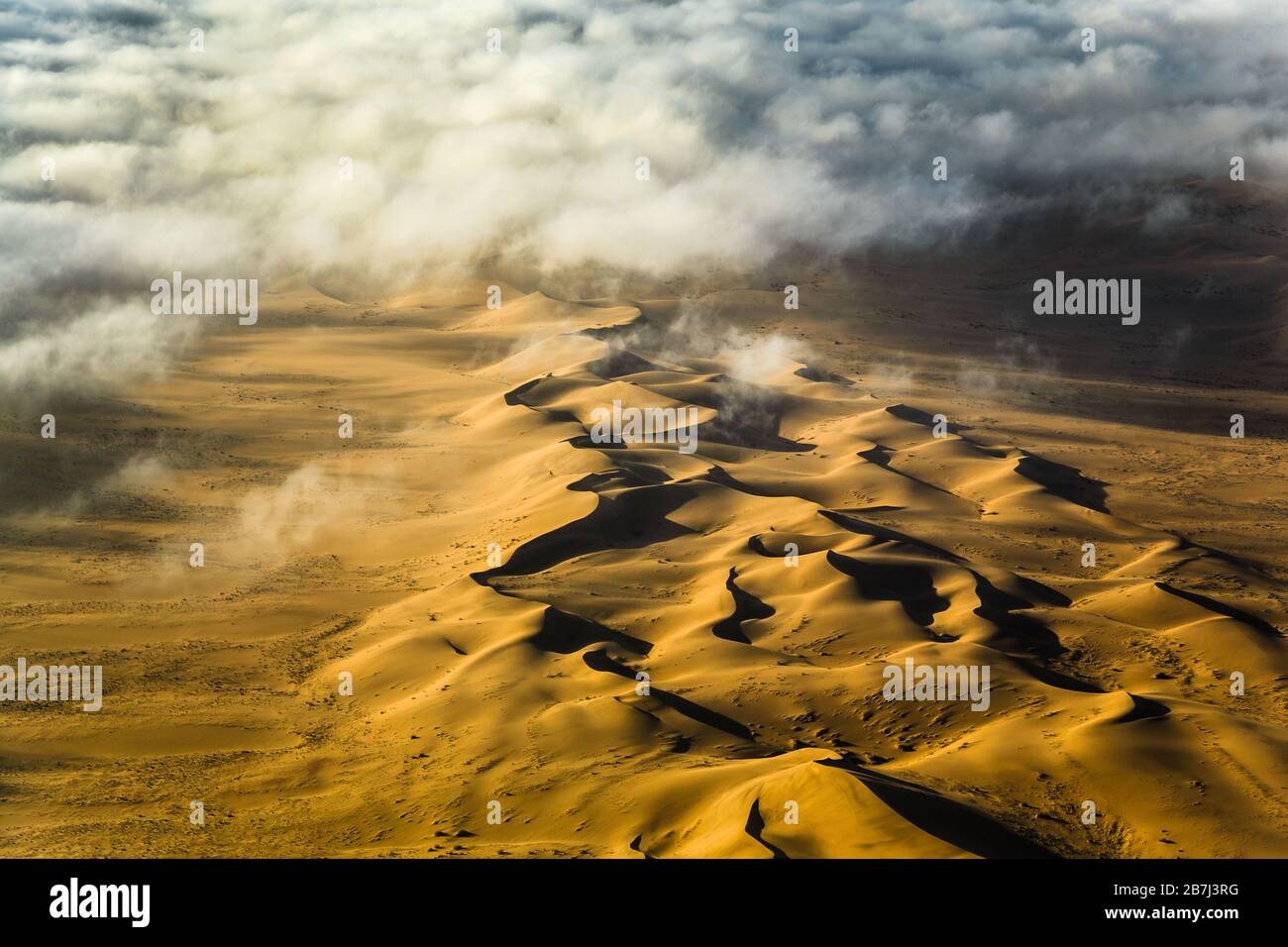 Sand dunes of Namib desert from aircraft on Skeleton coast in Namibia ...